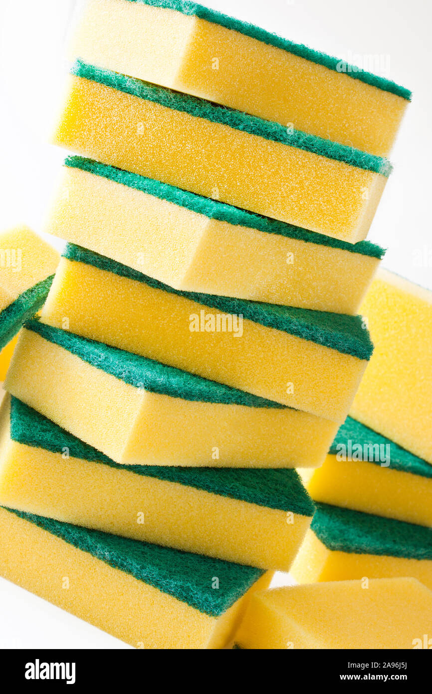 Household cleaning sponges against white background Stock Photo - Alamy