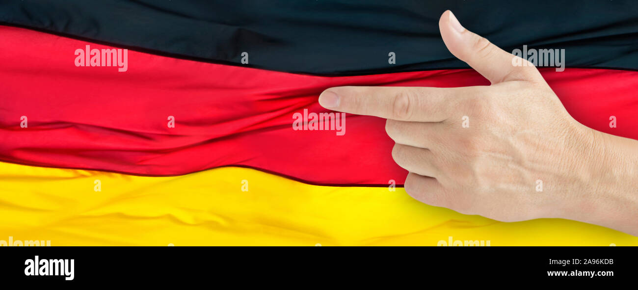 German Flag and Hand Stock Photo - Alamy