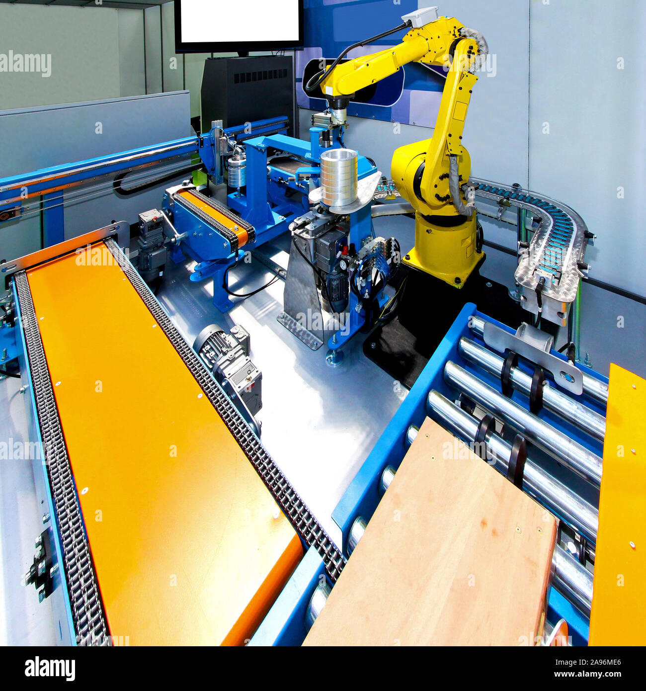 Production line with one automatic robotic arm Stock Photo - Alamy