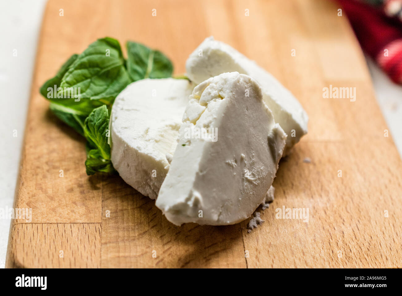 Goat Cheese Slices on Wooden Board. Ready to Eat. Organic Food Stock ...