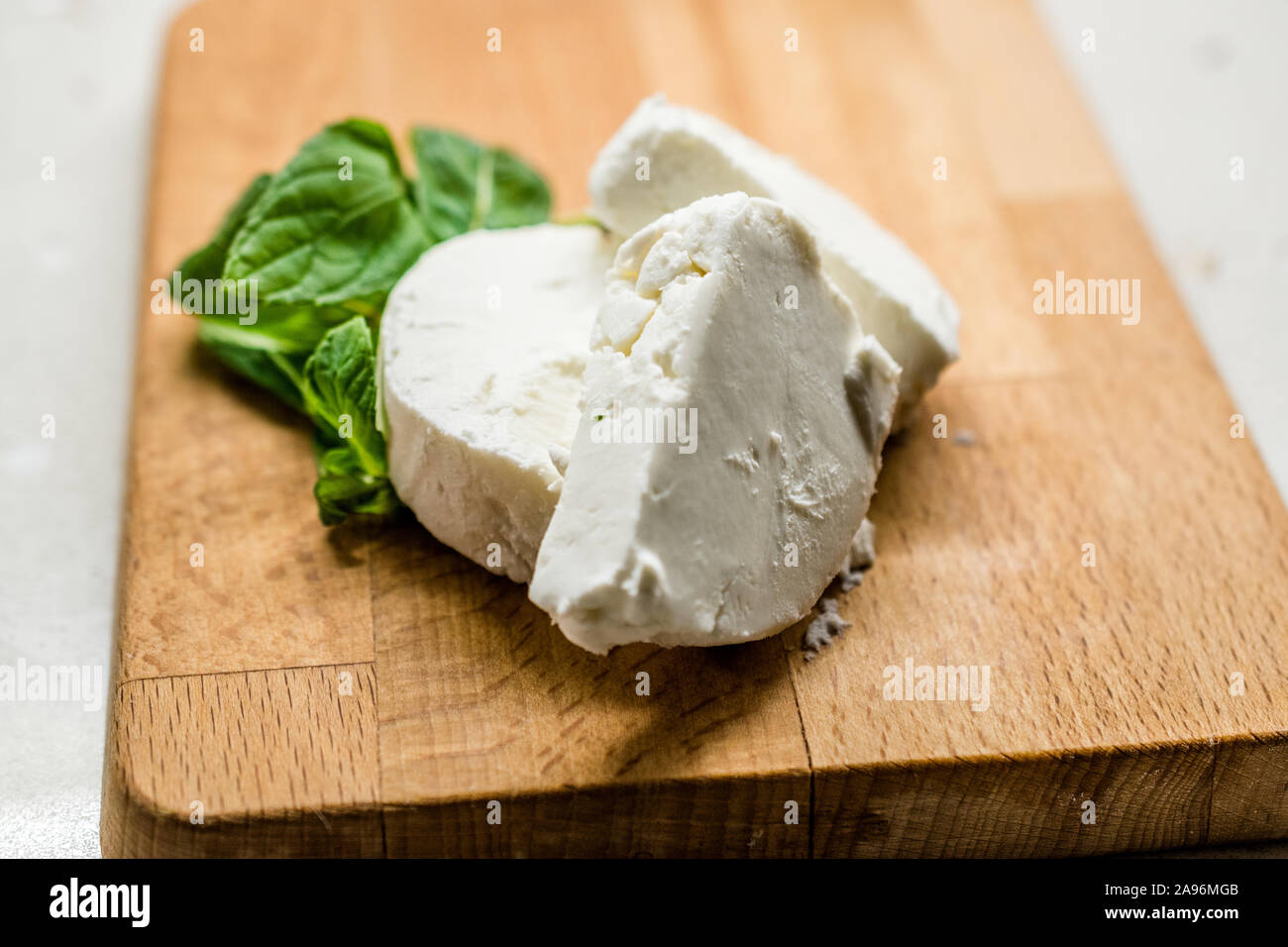 Goat Cheese Slices on Wooden Board. Ready to Eat. Organic Food Stock ...