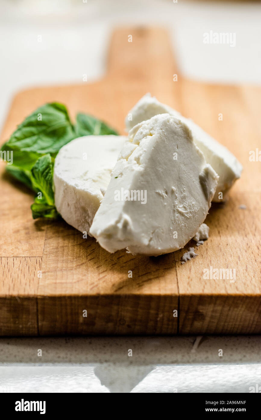 Goat Cheese Slices on Wooden Board. Ready to Eat. Organic Food Stock ...
