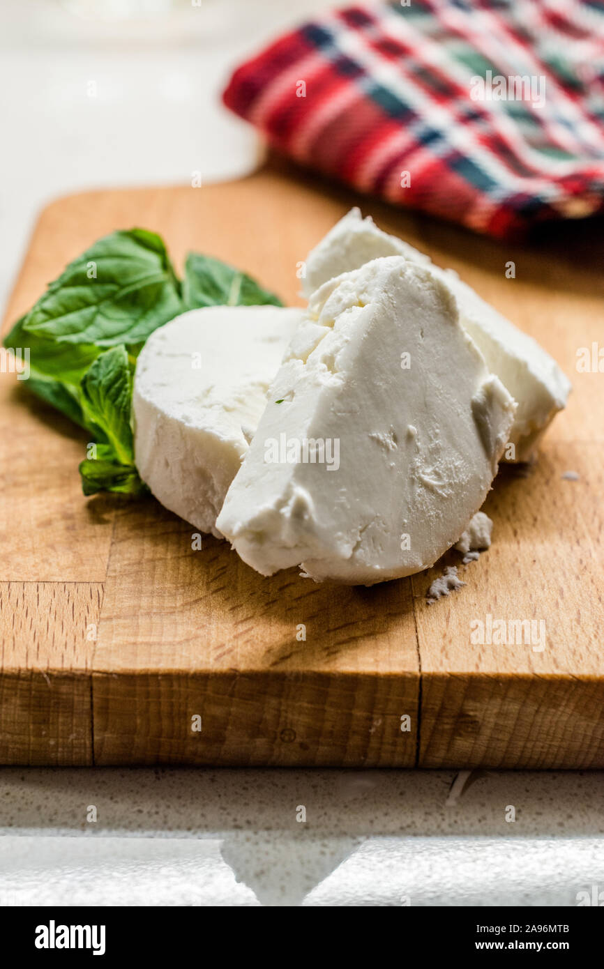 Goat Cheese Slices on Wooden Board. Ready to Eat. Organic Food Stock ...