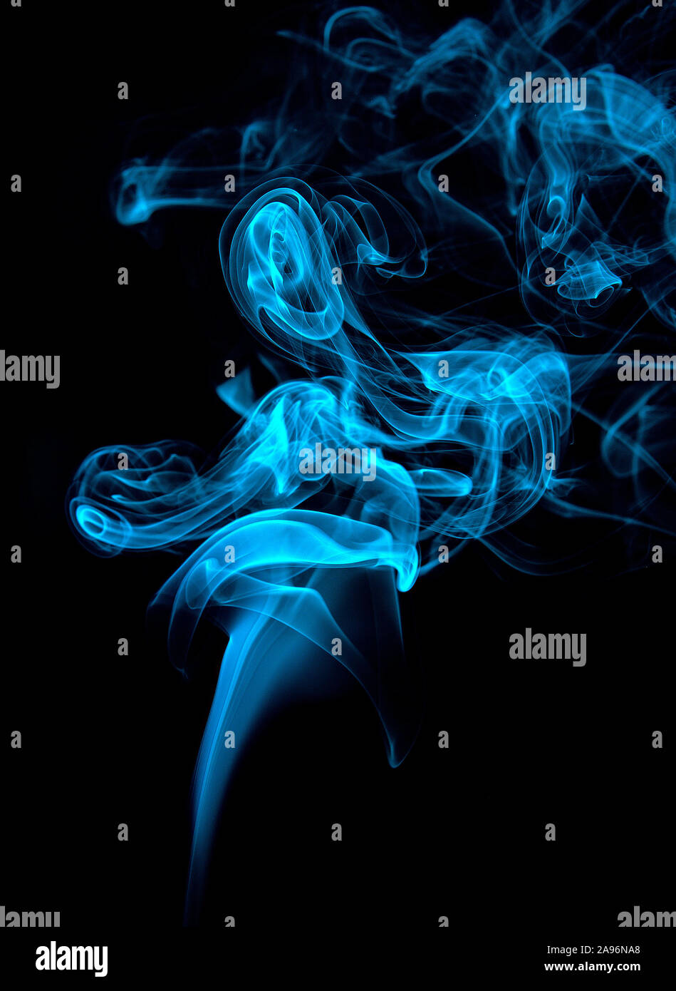 isolated colored smoke in a black background Stock Photo - Alamy