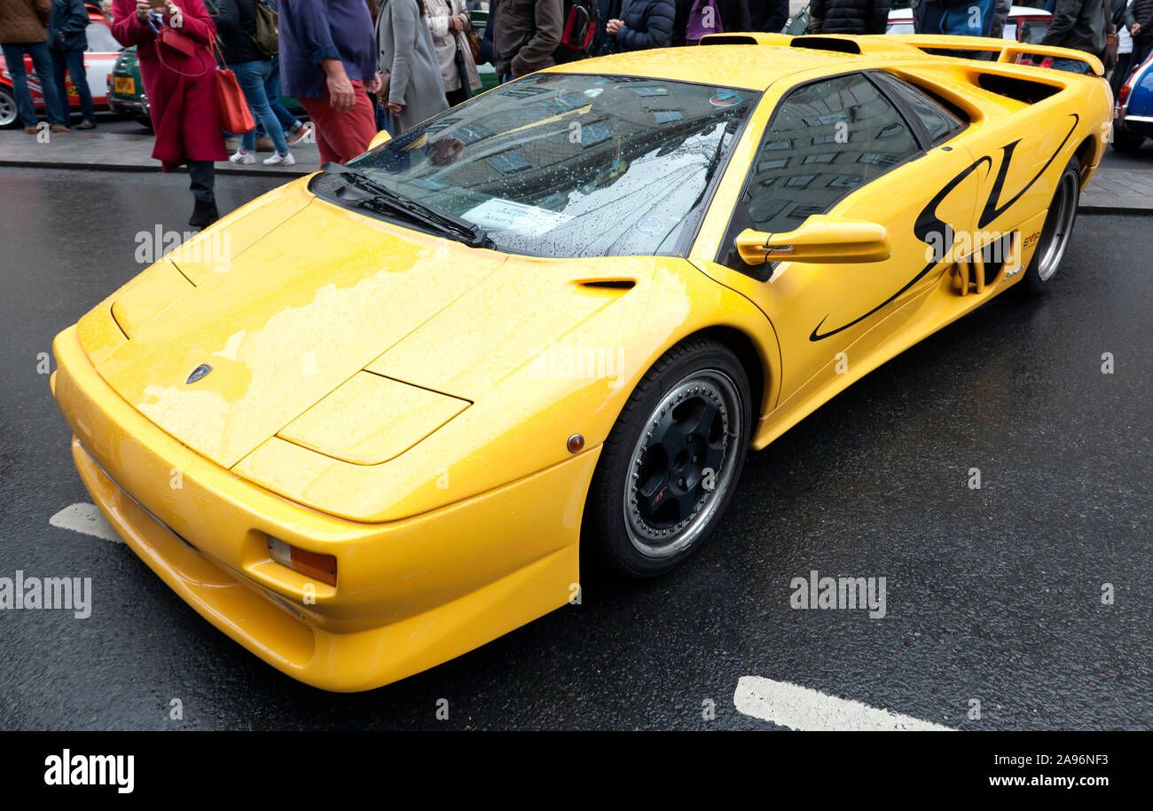 Three-quarter front view of a 1997, Yellow, Lamborghini Diablo Super ...