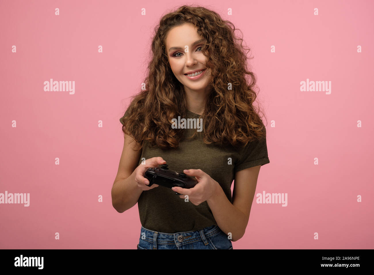 Portrait girl holding game controller hi-res stock photography and ...