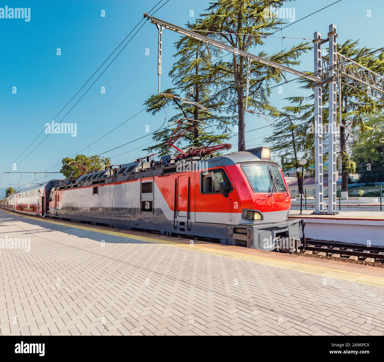 Passenger double deck train is ready to depart from the main railway ...
