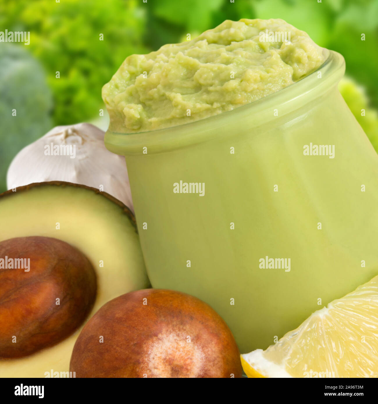 Guacamole and Avocados close up Stock Photo - Alamy