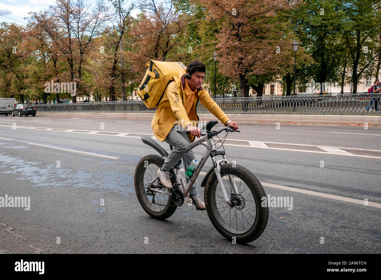 Moscow, Russia - September 14, 2019: Yandex Eda courier in branded ...