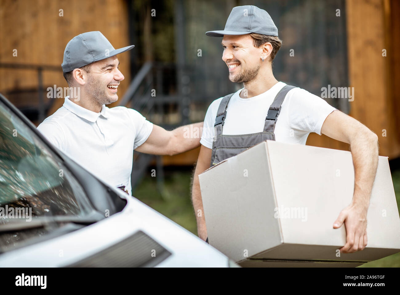 Delivering together team hi-res stock photography and images - Alamy
