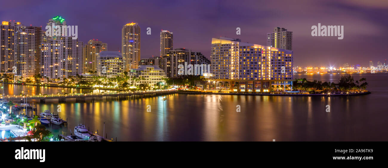 Aerial Miami skyscrapers with colorful lights Stock Photo - Alamy