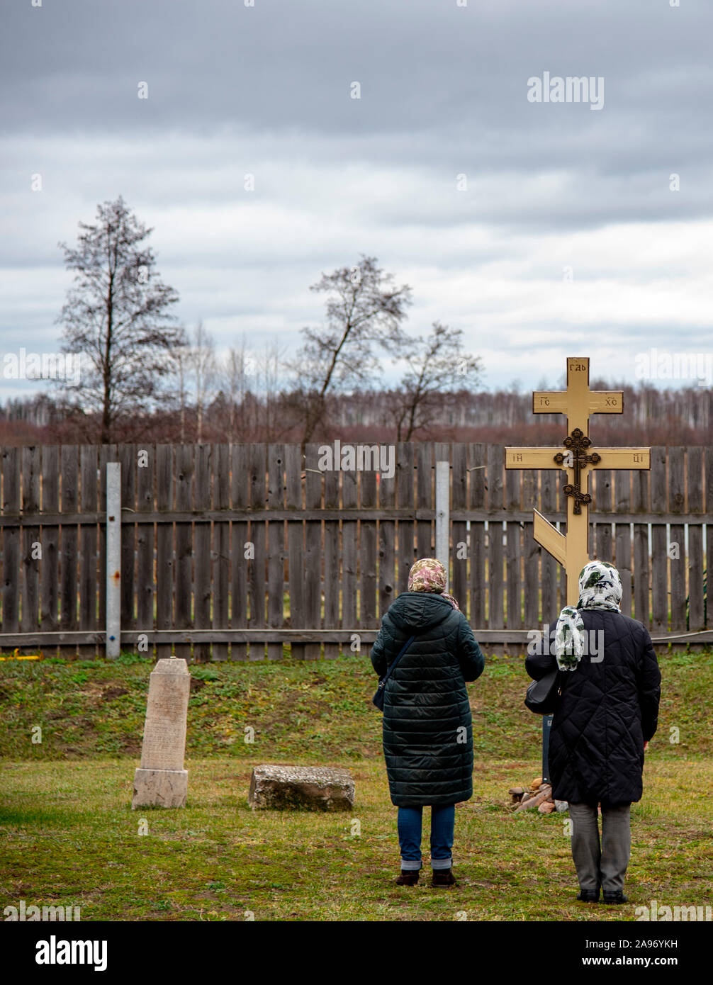 Two women make a pilgrimage to Holy places. Pray at the cross Stock ...