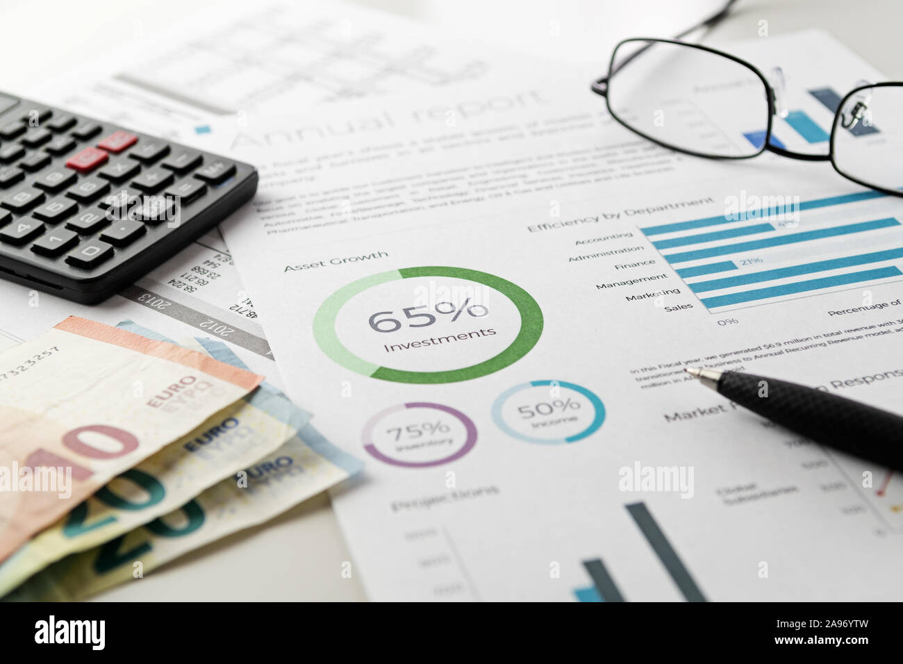 Mockup investment financial charts report sheet with visible pen ...