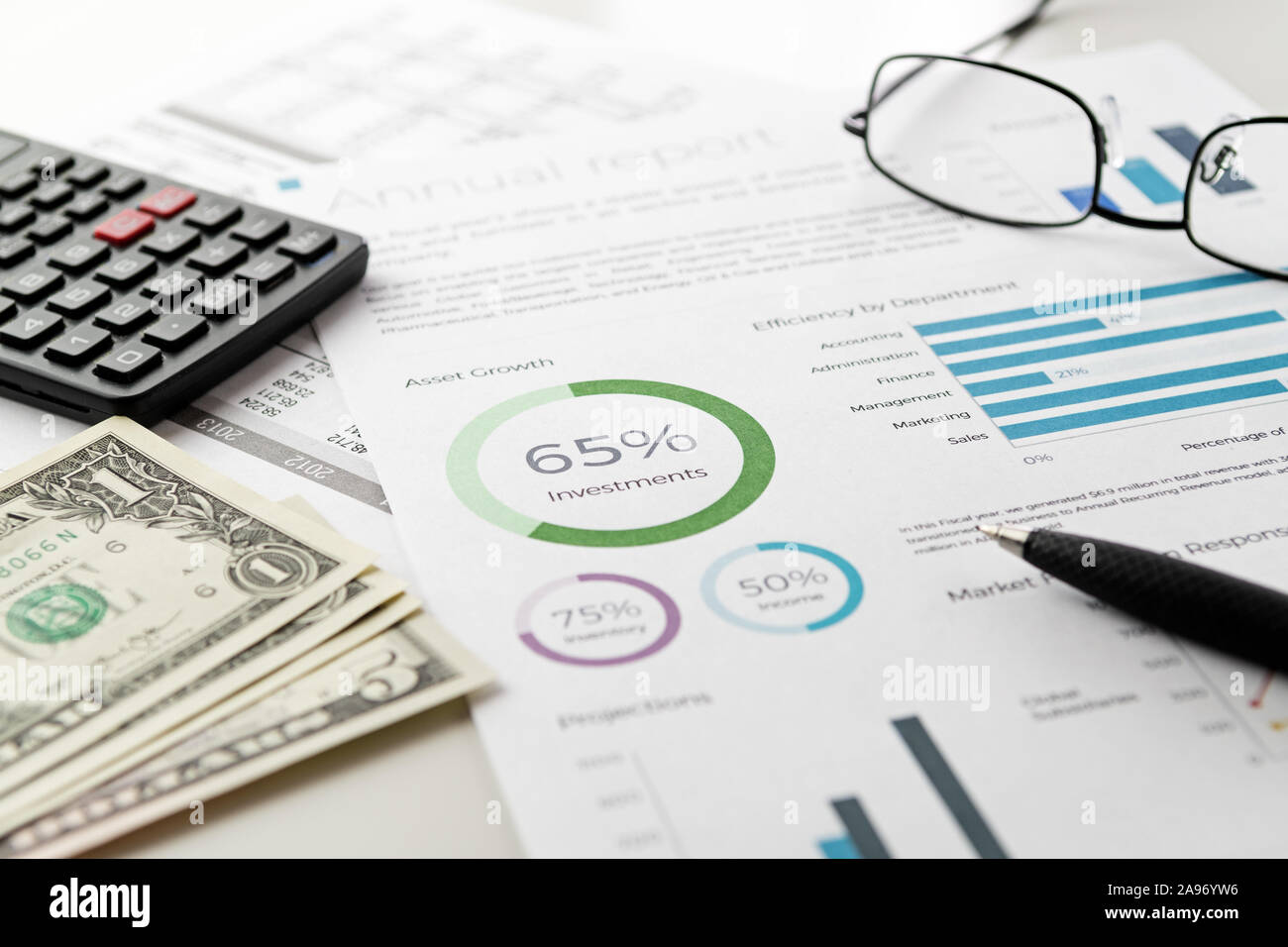 Mockup investment financial charts report sheet with visible pen ...