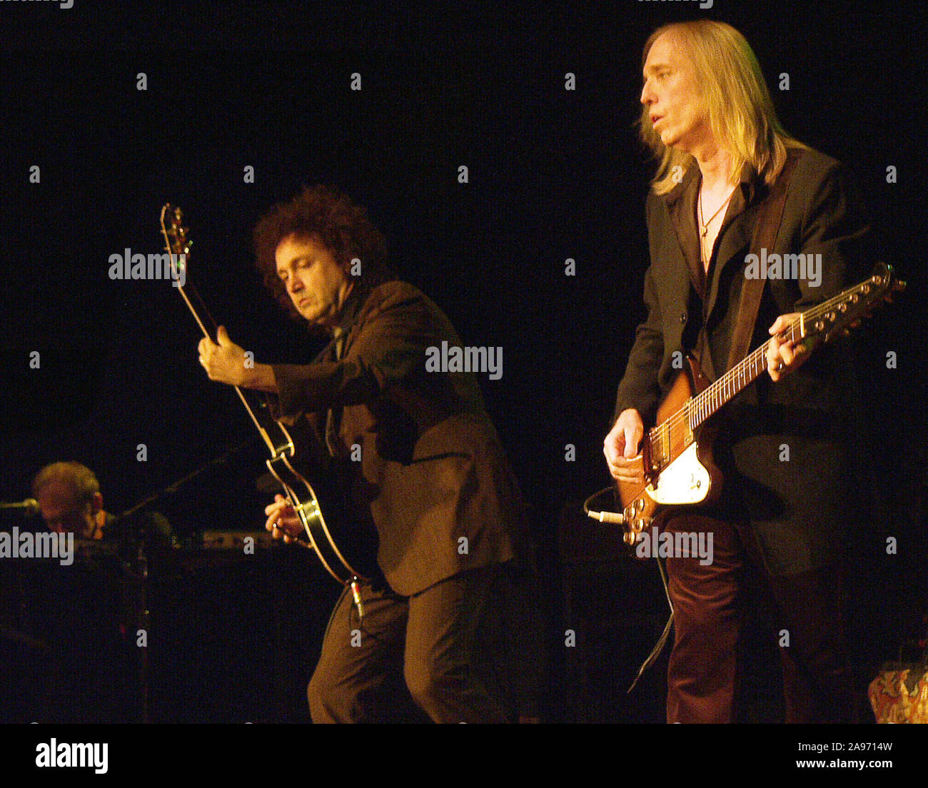 AUGUST 9: Benmont Tench, Mike Campbell, and Tom Petty of Tom Petty And ...