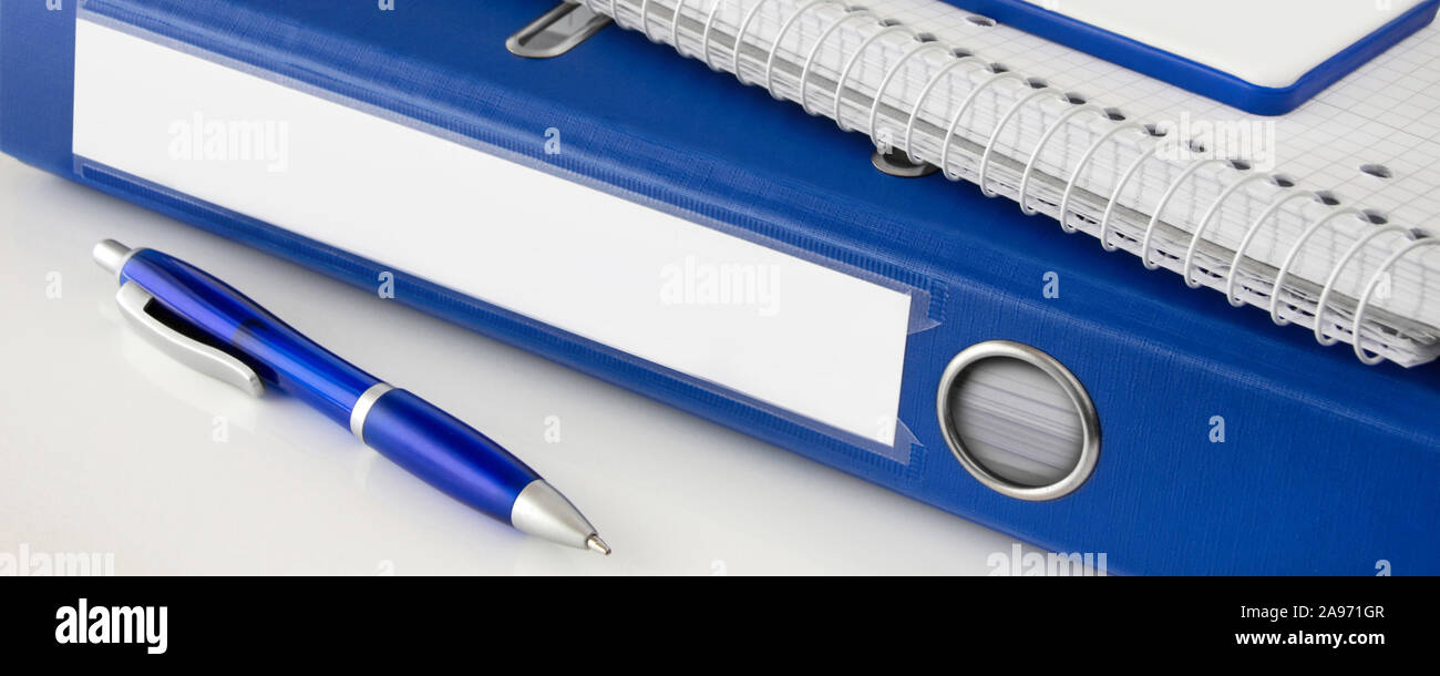 Office work blue file folder and pen Stock Photo - Alamy