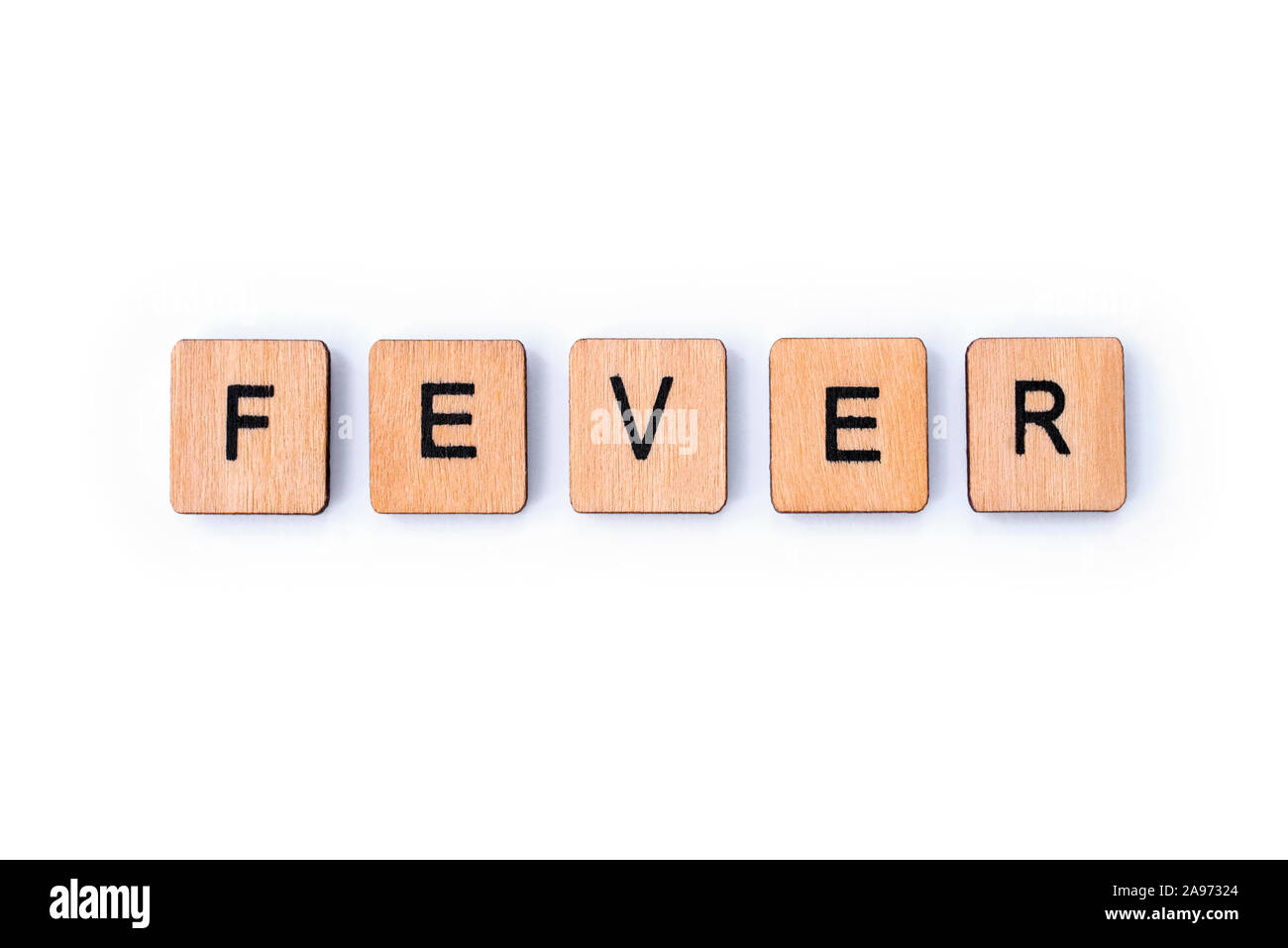 The word FEVER, spelt with wooden letter tiles over a white background ...