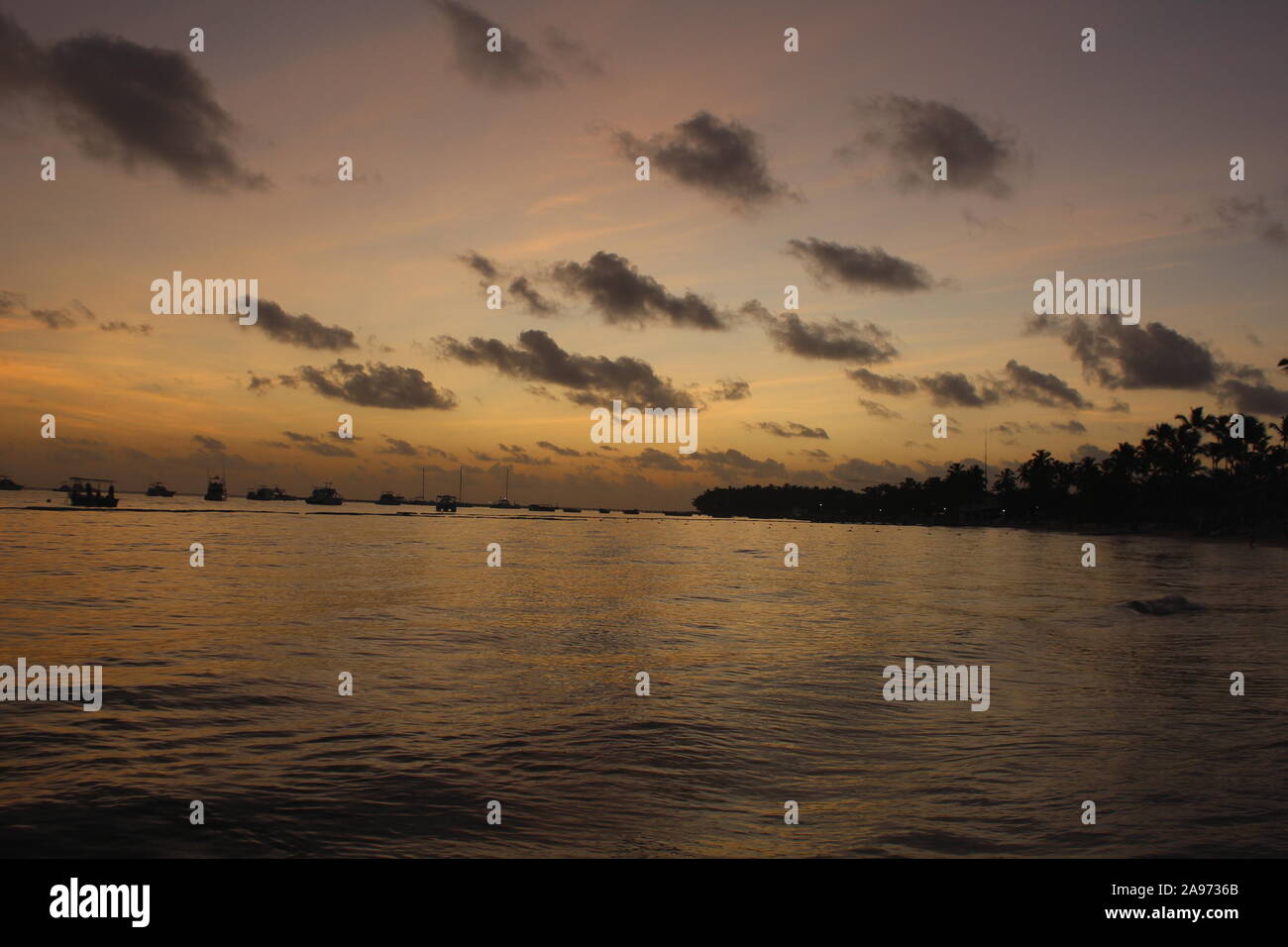 sunset on the beach in Punta Cana Dominican Republic Stock Photo - Alamy