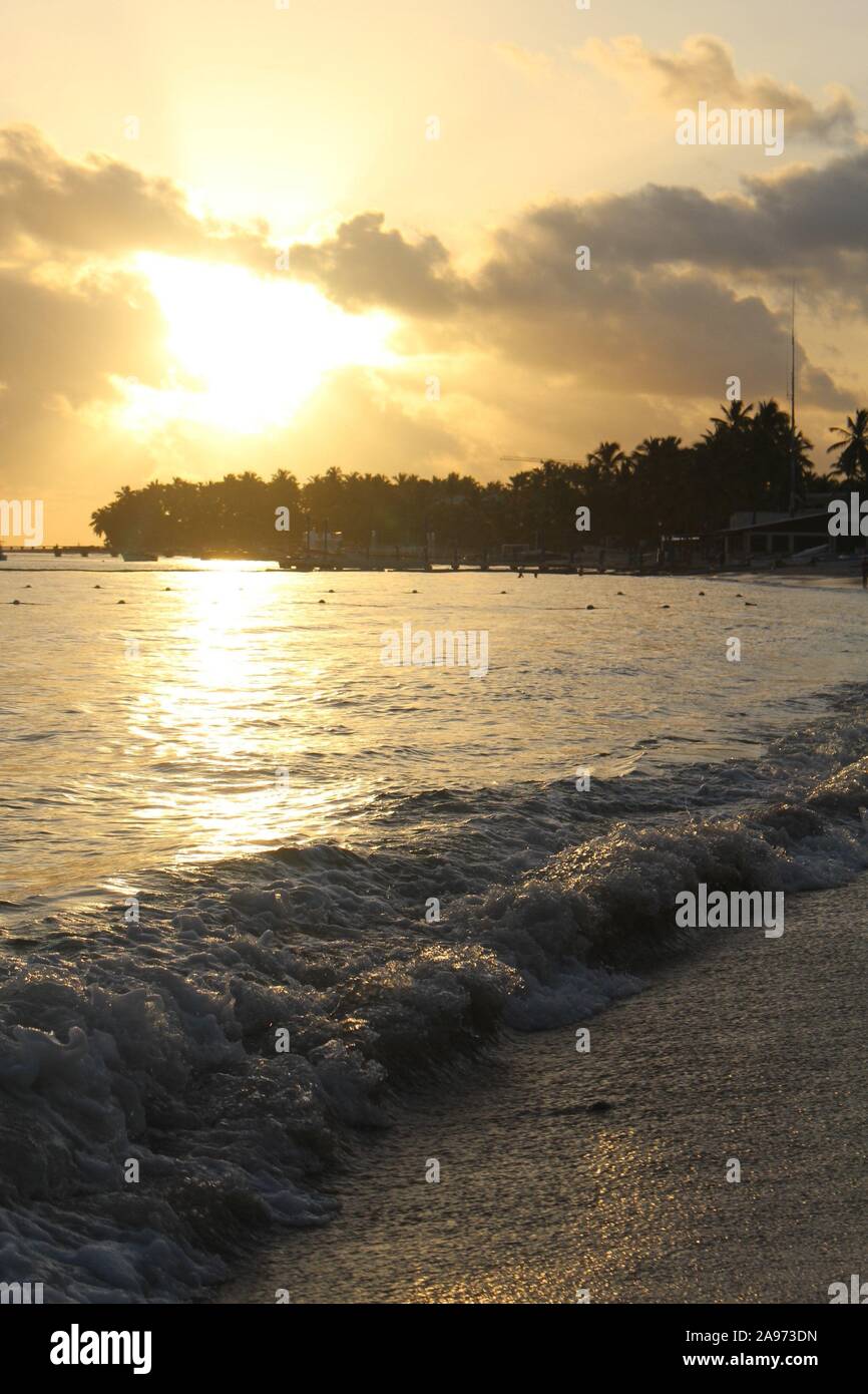 sunset on the beach in Punta Cana Dominican Republic Stock Photo - Alamy