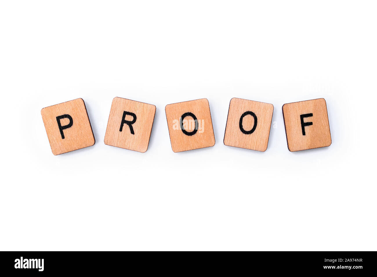 The word PROOF, spelt with wooden letter tiles over a plain white ...