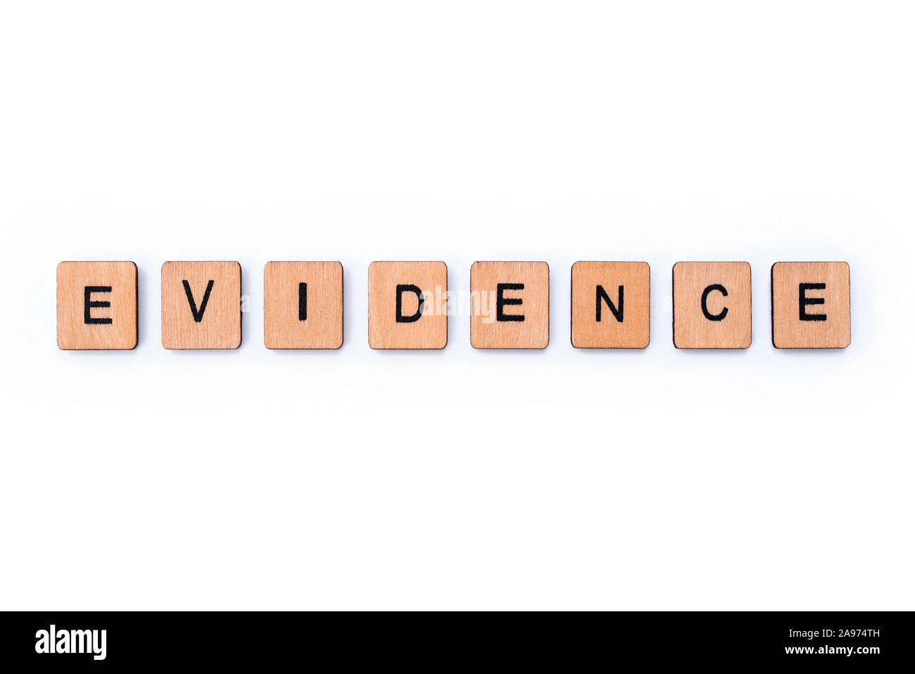 The word EVIDENCE, spelt with wooden letter tiles over a plain white ...