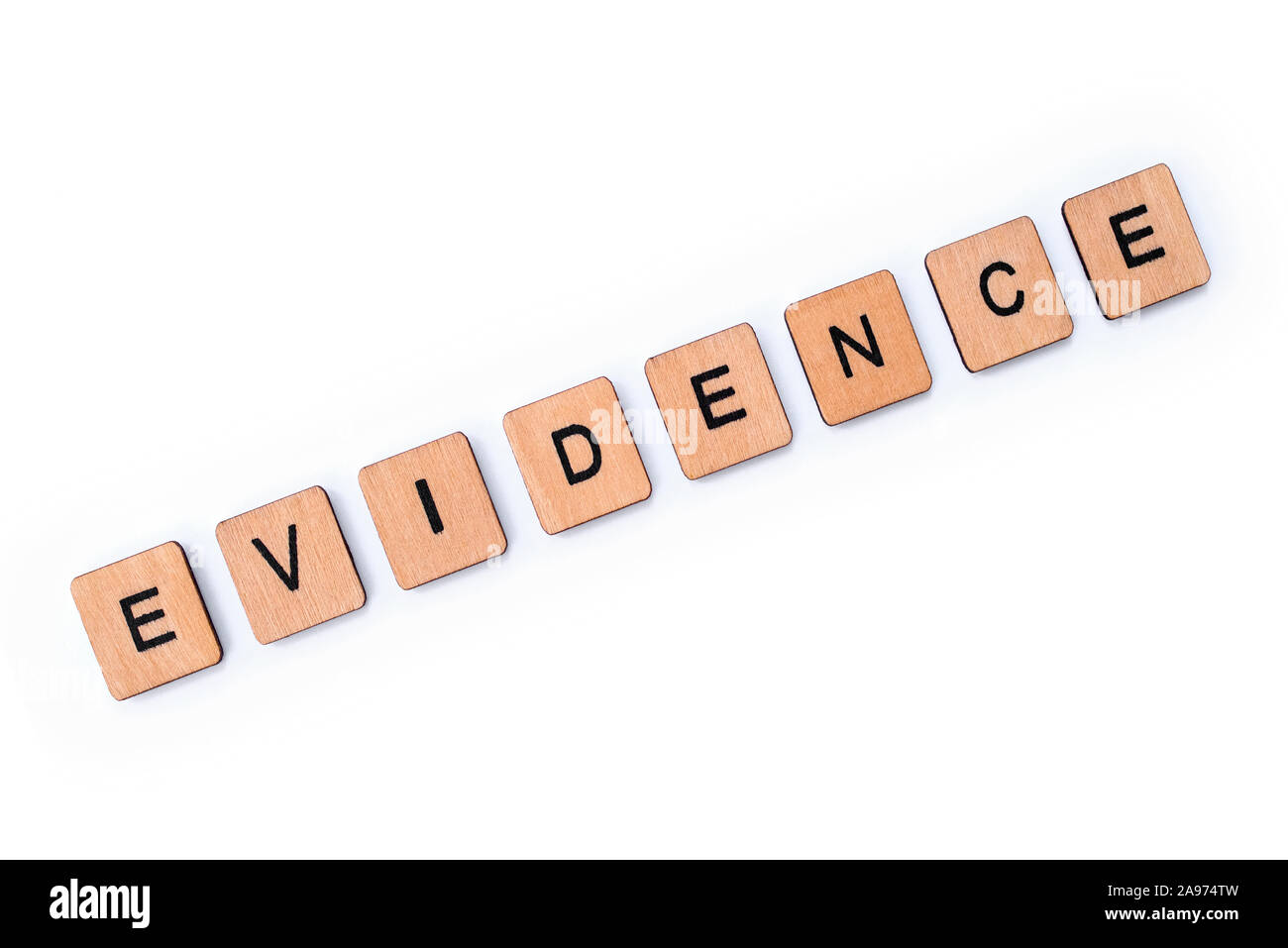 The word EVIDENCE, spelt with wooden letter tiles over a plain white ...