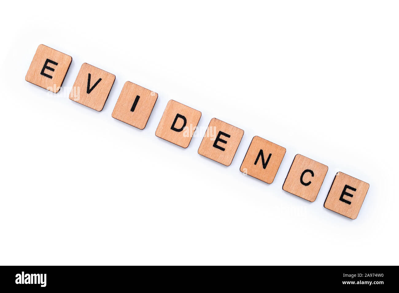 The word EVIDENCE, spelt with wooden letter tiles over a plain white ...