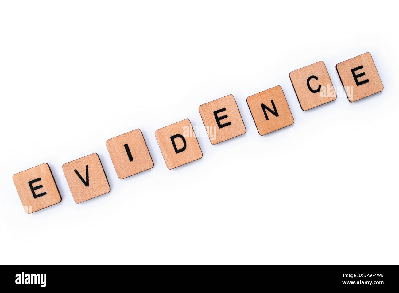 The word EVIDENCE, spelt with wooden letter tiles over a plain white ...