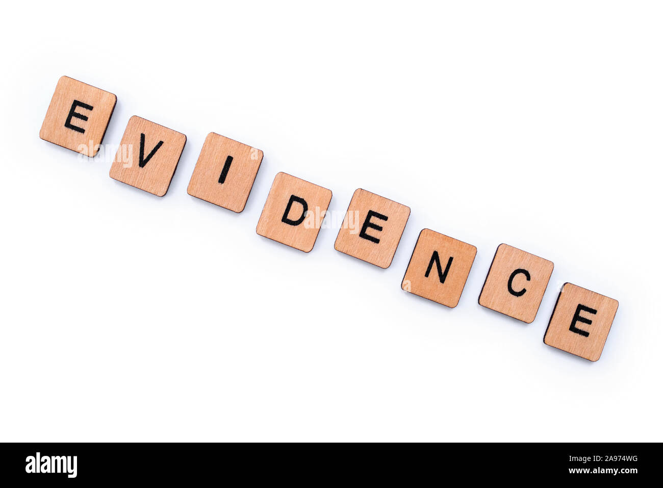The word EVIDENCE, spelt with wooden letter tiles over a plain white ...