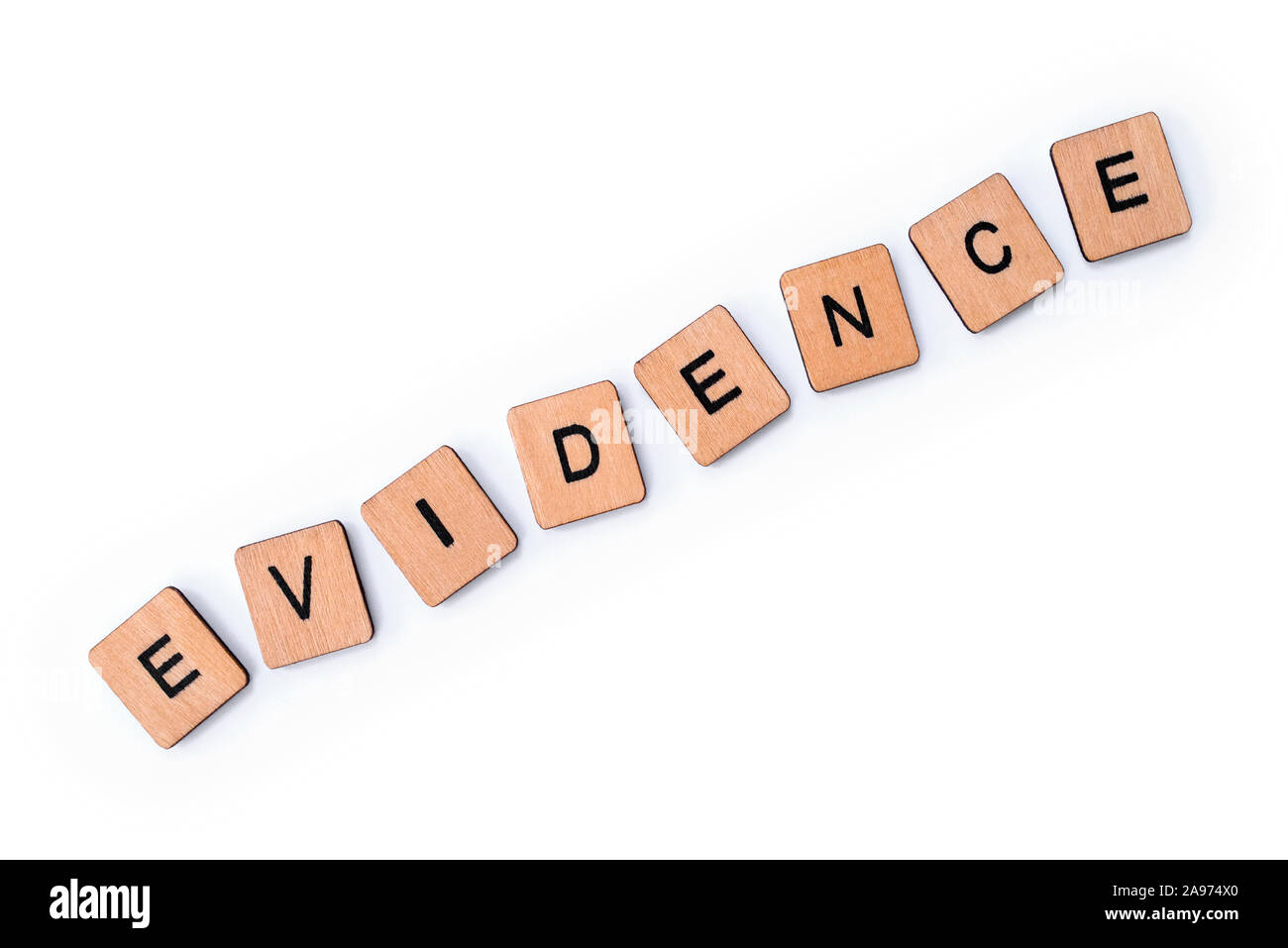 The word EVIDENCE, spelt with wooden letter tiles over a plain white ...