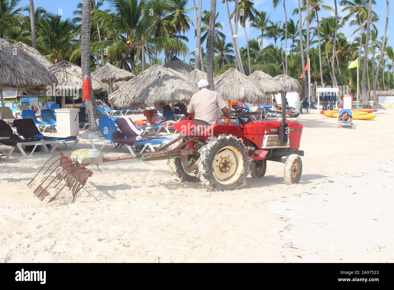 tractor combing sand Punta Cana Dominican Republic beach Stock Photo ...