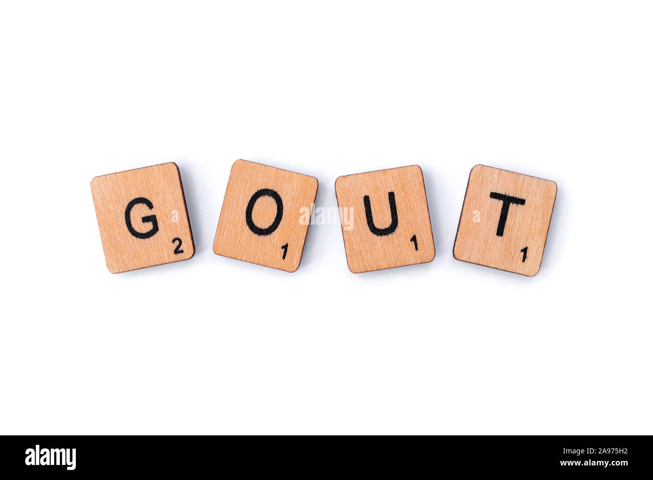 London, UK - July 8th 2019: The word GOUT, spelt with wooden letter ...