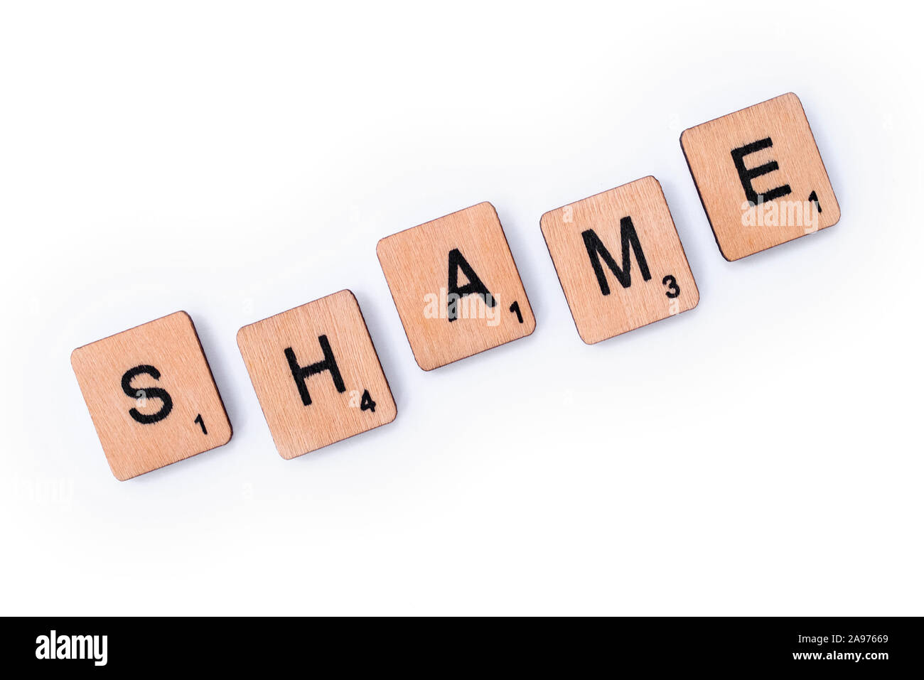 London, UK - July 8th 2019: The word SHAME, spelt with wooden letter ...