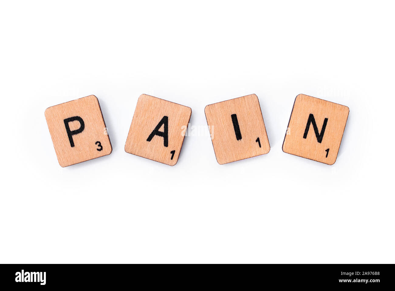 London, UK - July 8th 2019: The word PAIN, spelt with wooden letter ...