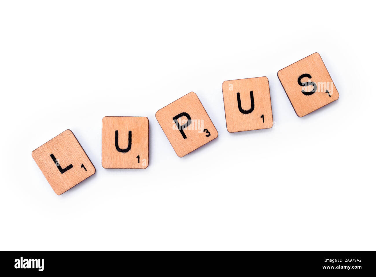 London, UK - June 16th 2019: LUPUS, spelt with wooden letter tiles over ...