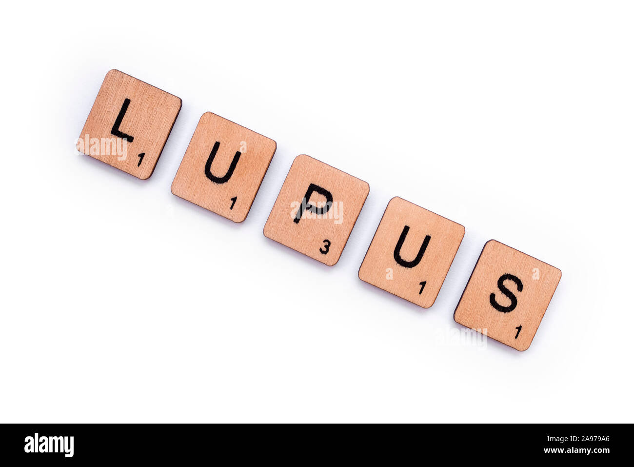 London, UK - June 16th 2019: LUPUS, spelt with wooden letter tiles over ...