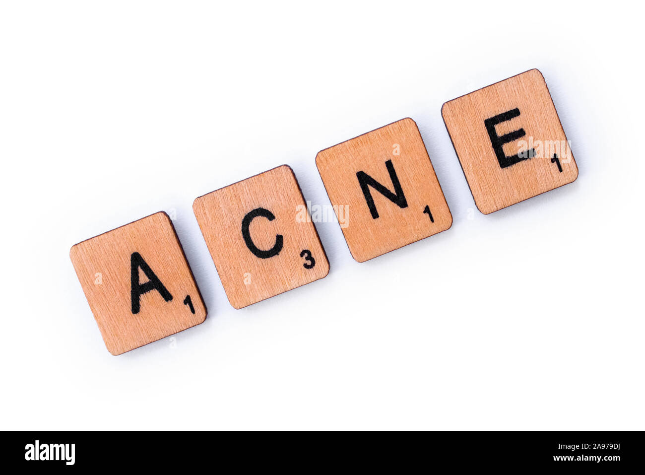 London, UK - June 16th 2019: The word ACNE, spelt with wooden letter ...