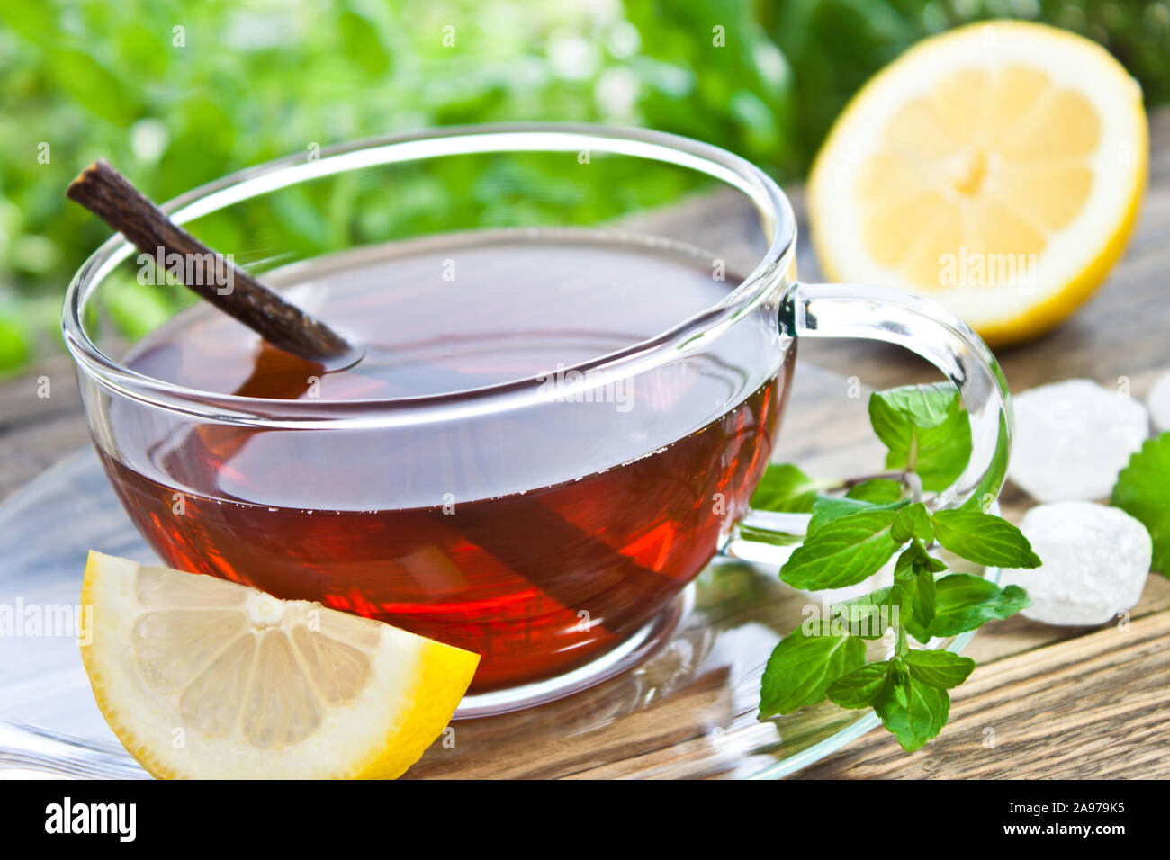 Glass tea cup and lemon Stock Photo - Alamy