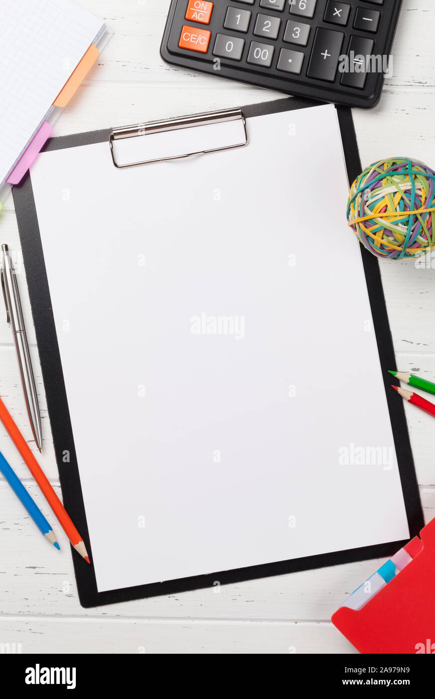 Office workplace table with blank a4 page and supplies. Flat lay. Top ...