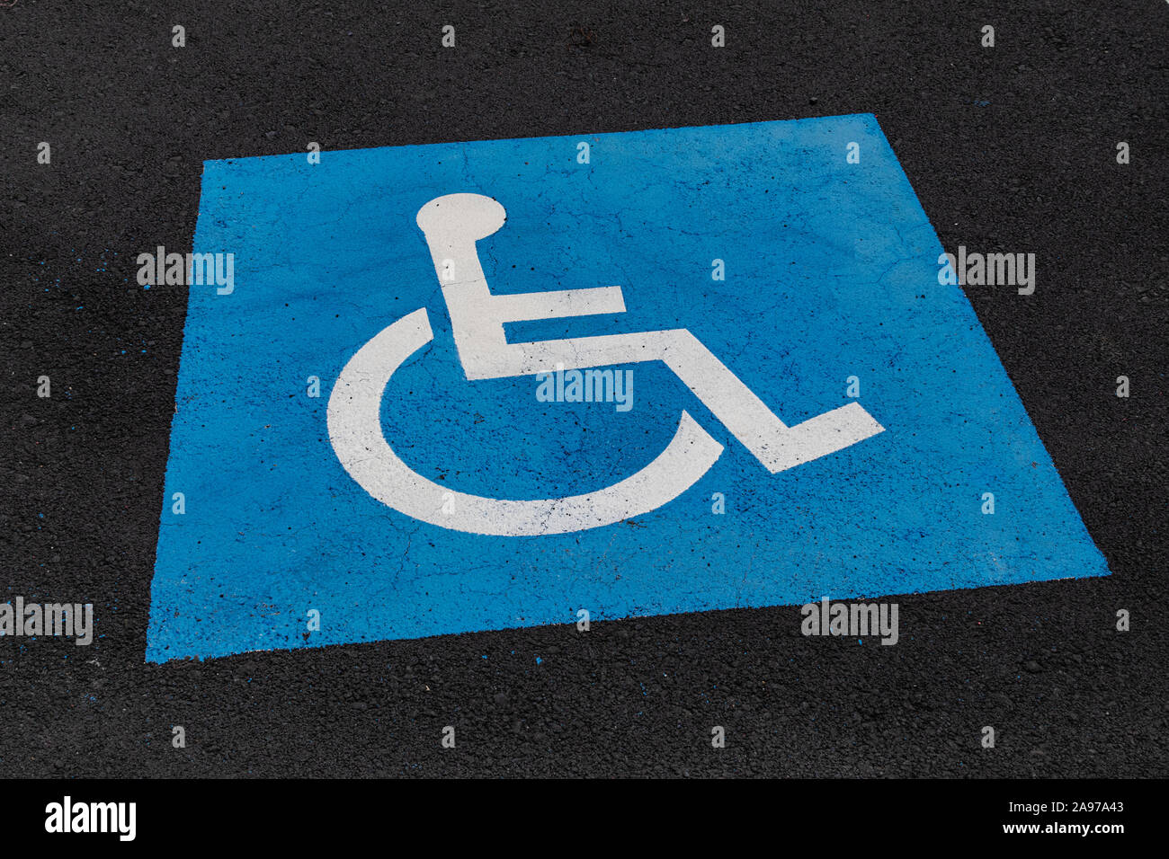 disabled parking blue/white sign, painted on asphalt surface Stock ...