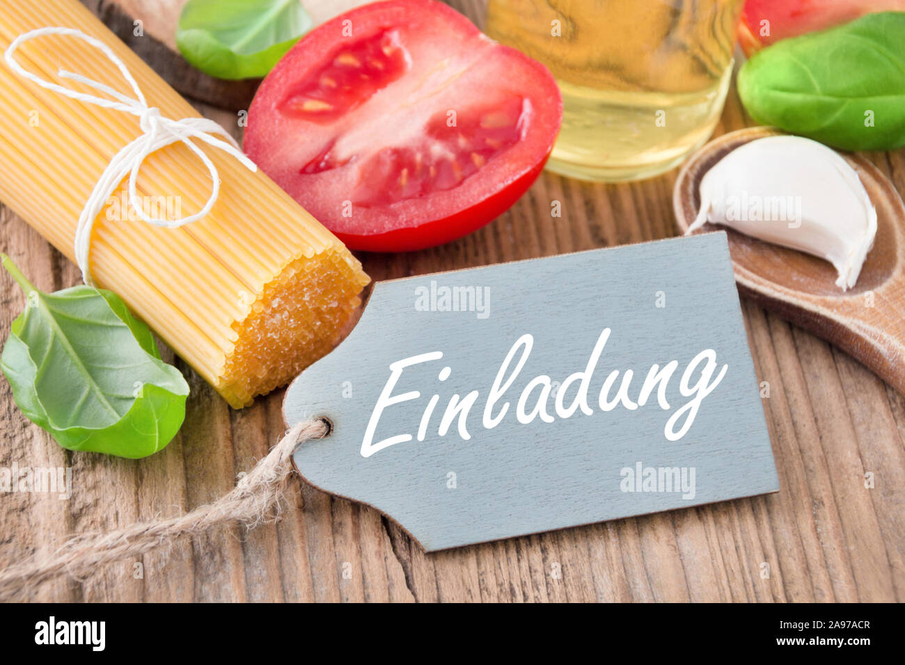 Spaghetti and label German: Invitation Stock Photo - Alamy