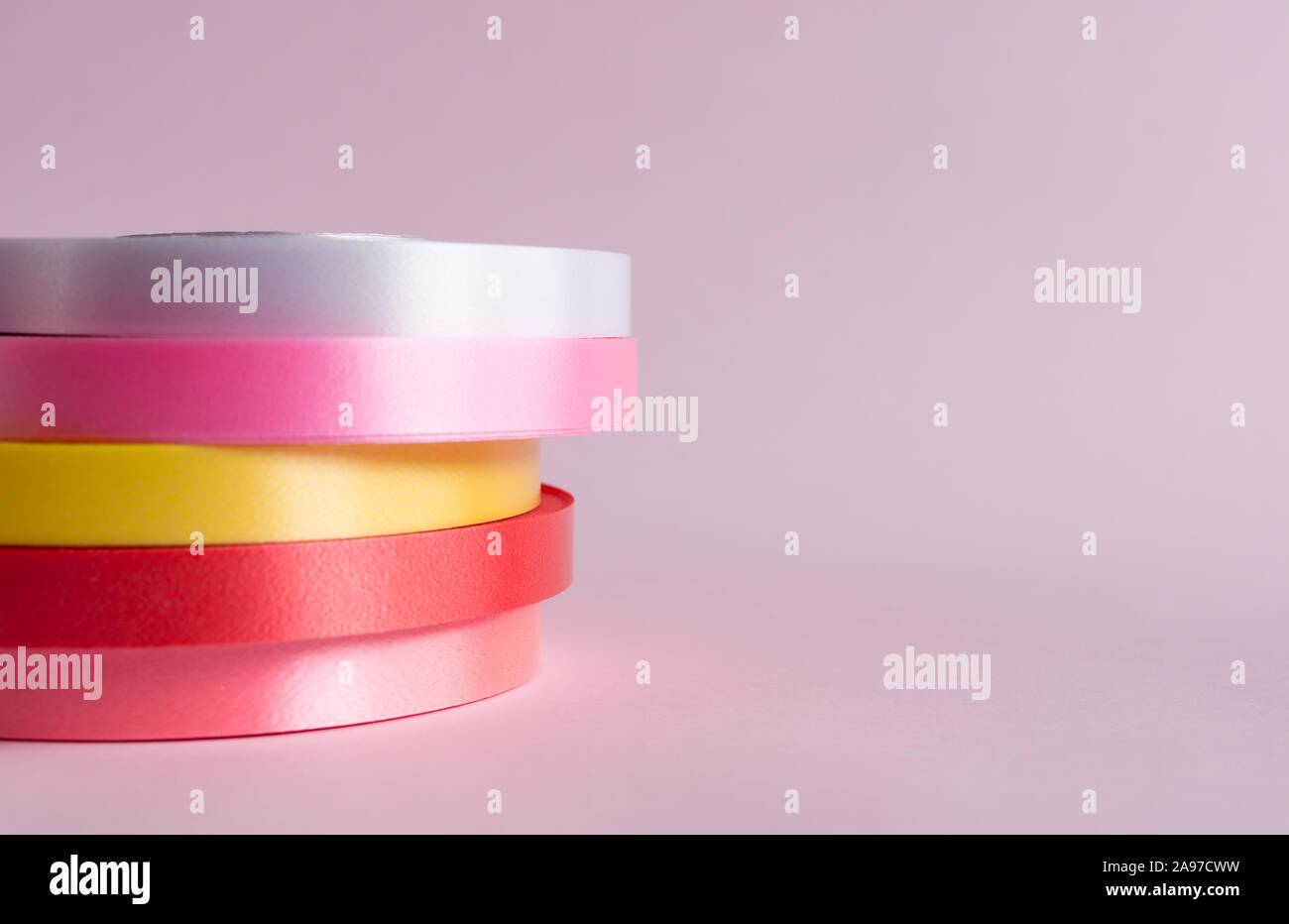 Pink ribbon roll hi-res stock photography and images - Alamy