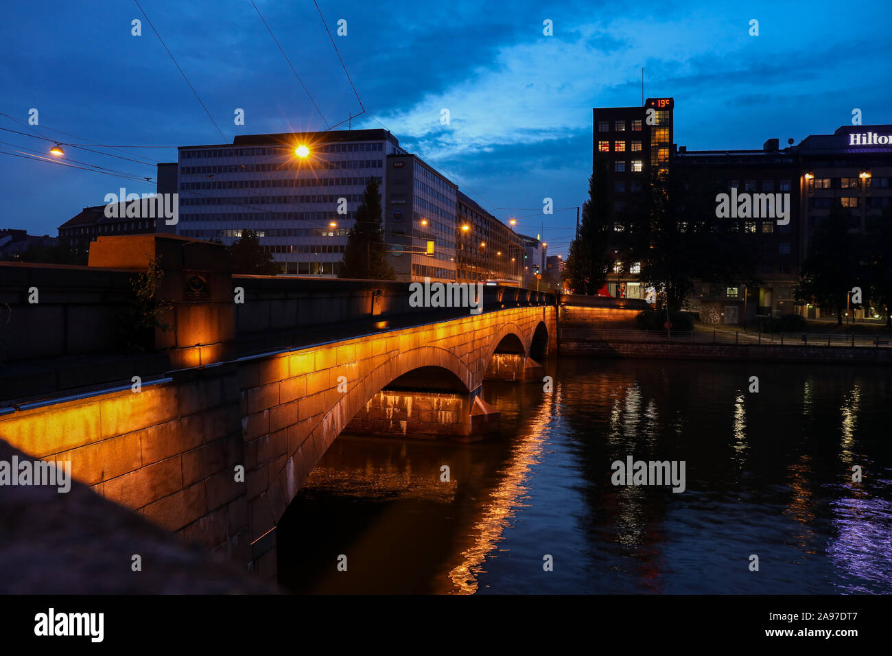 Illuminated Pitkäsilta bridge at night time in Helsinki, Finland Stock ...
