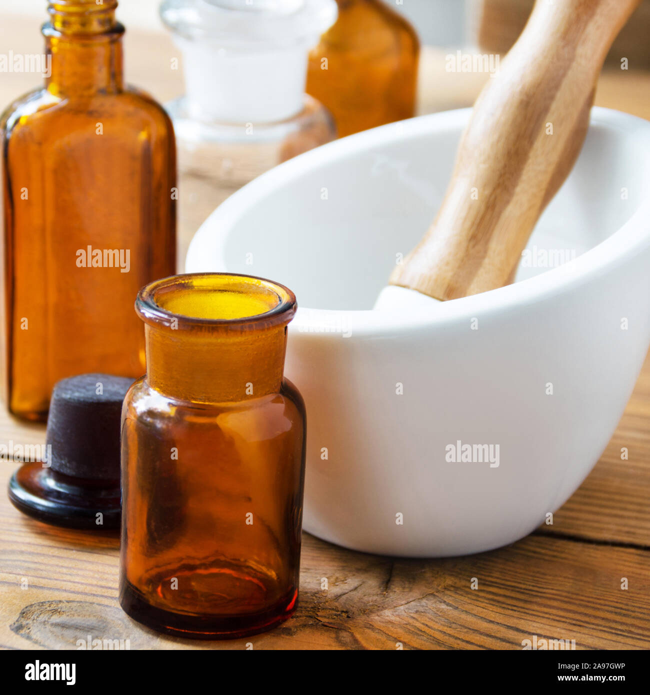 Mortar and medicine bottles Stock Photo - Alamy