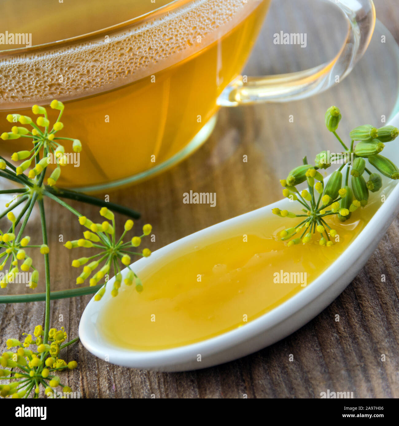 Glass cup and fennel teaFennel tea and fennel honey Stock Photo - Alamy