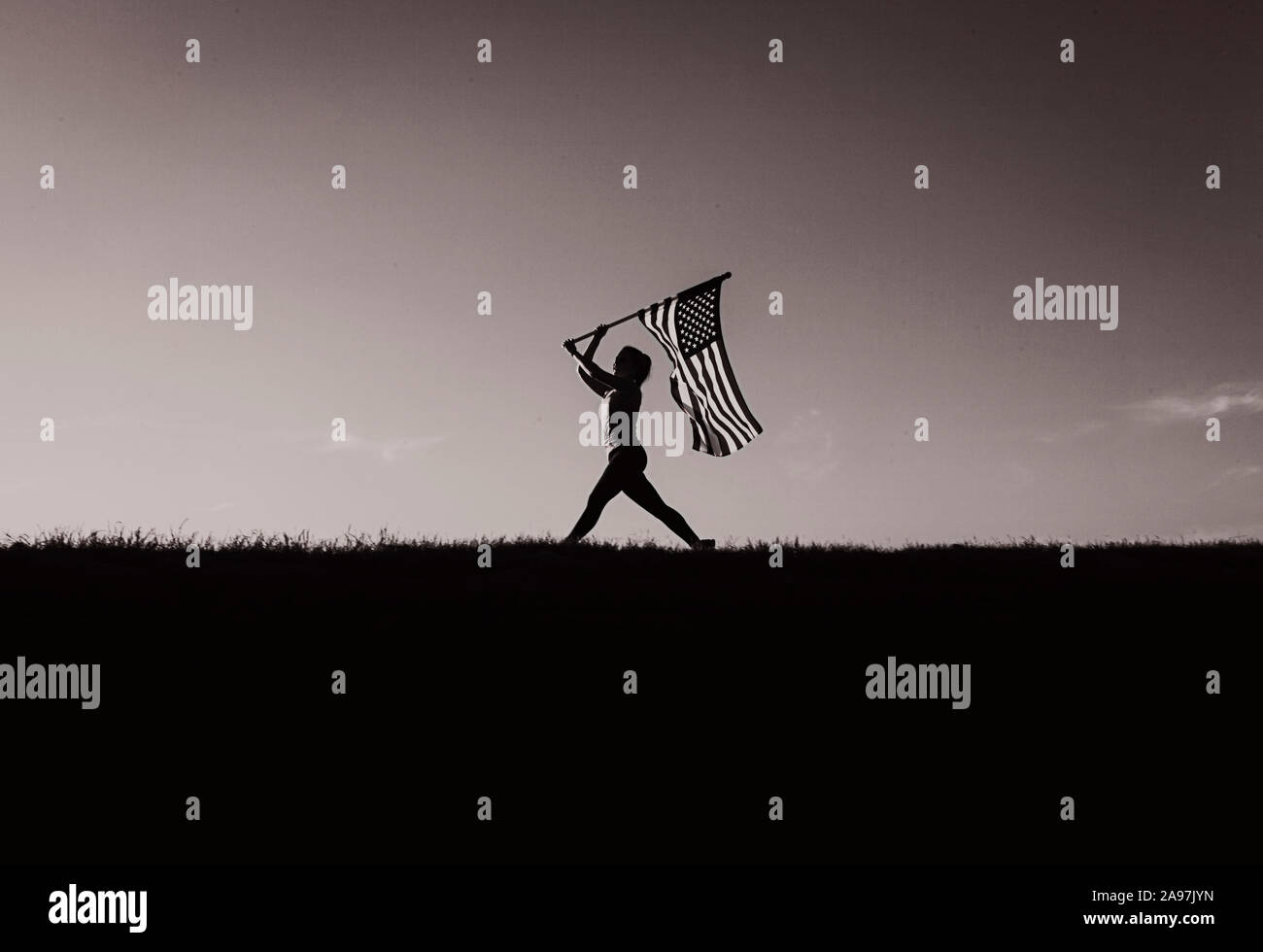 Woman Carrying American Flag Stock Photo - Alamy