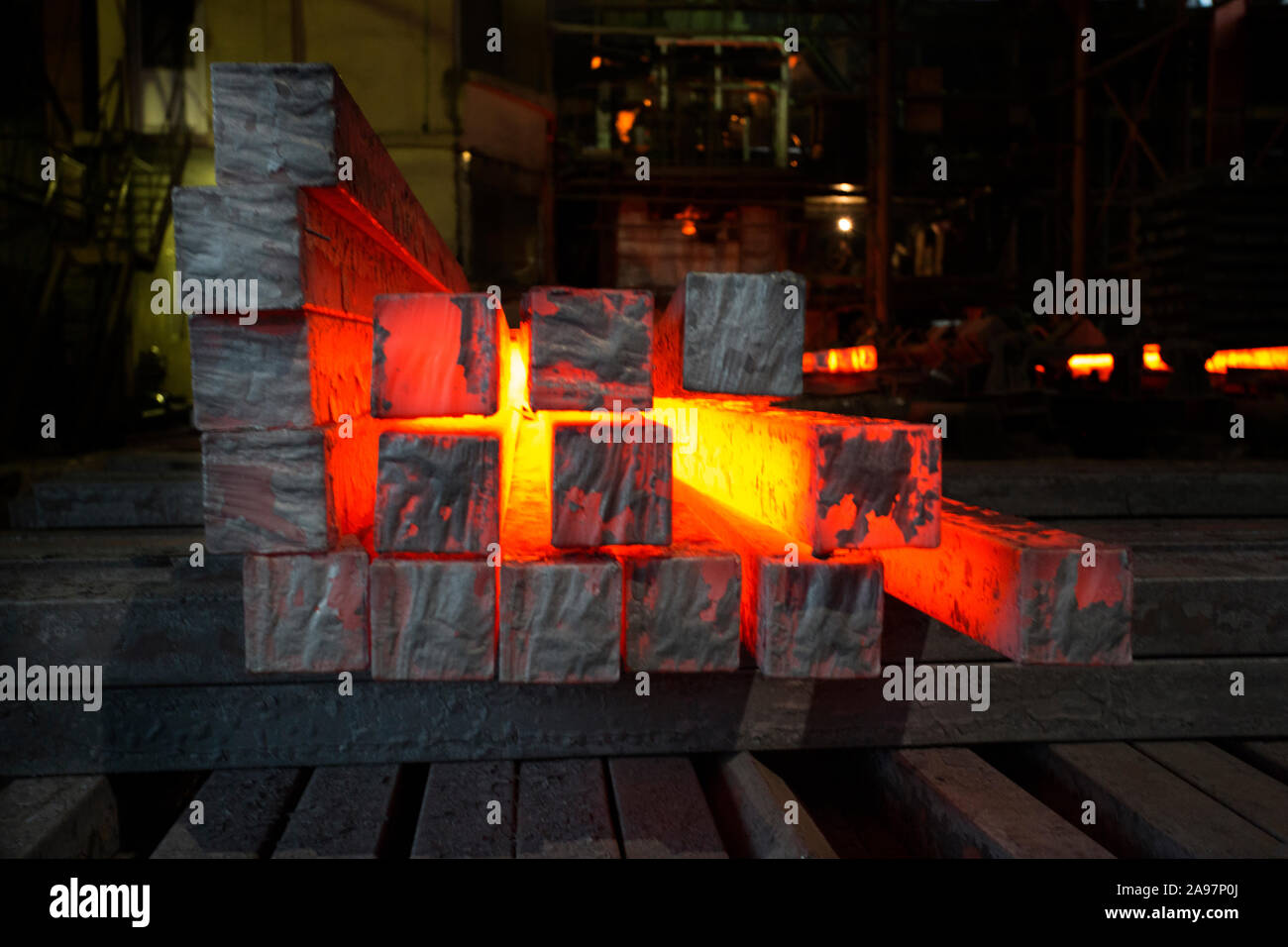 Heated metal pig gets squeezed and drilled at special metal forging ...