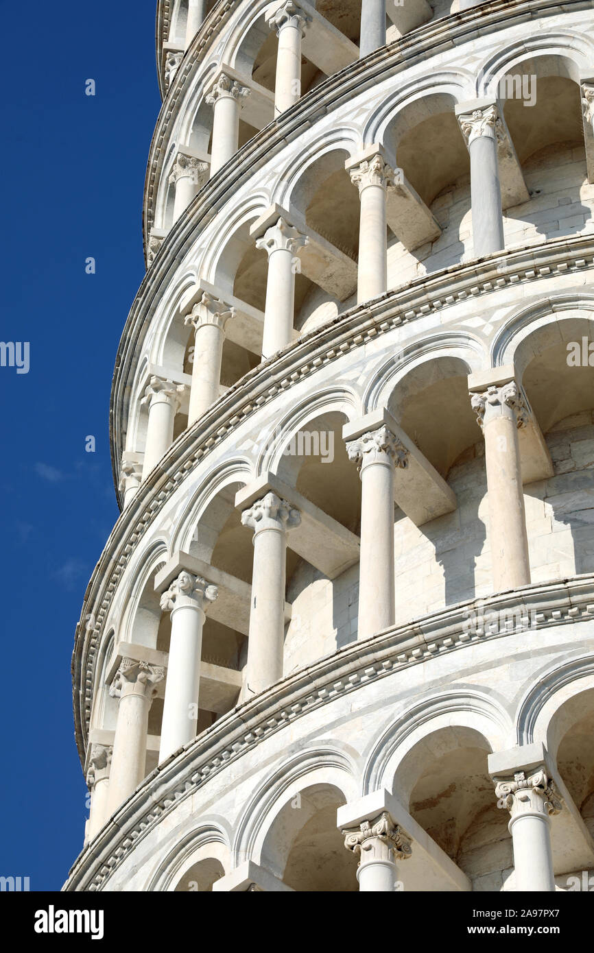 Architectural Detail of Leaning Tower of Pisa with white arches and ...