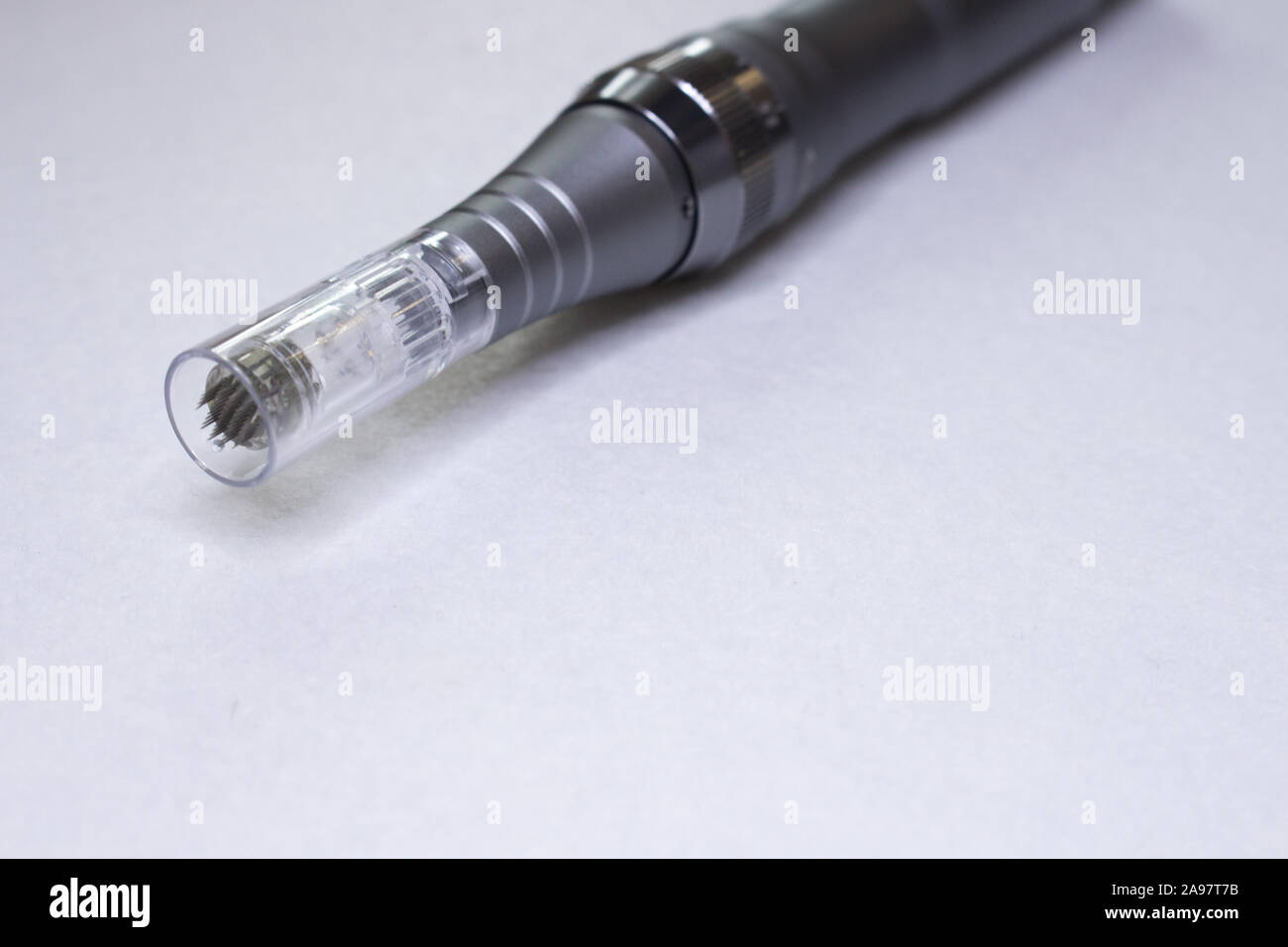 Dermis stamp electric pen. Dermapen. Needle mesotherapy treatment Stock ...