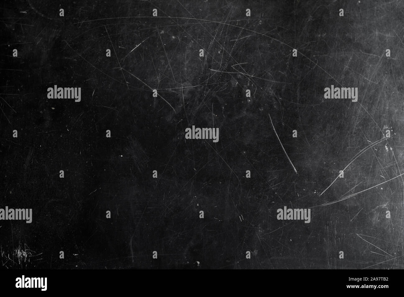 close up black chalk board with scratches and scuffs from white chalk ...